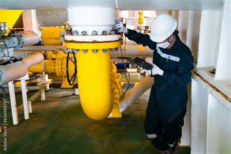 Non Destructive Testing Technicians Are Checking The Thickness Of Elbow Tubes Using Ultrasound