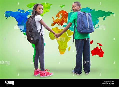 Composite Image Of Cute Pupils Holding Hands Stock Photo Alamy