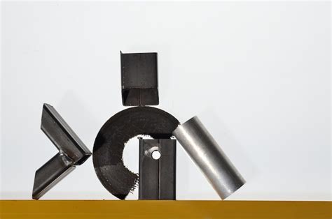 Premium Photo Composition Of Pieces Of Metal And A Broken Disk From A