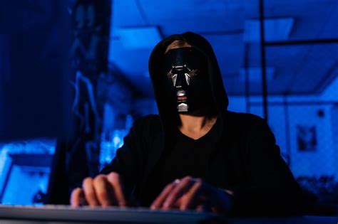 Premium Photo Dangerous Unrecognizable Hacker Man Wearing In Black