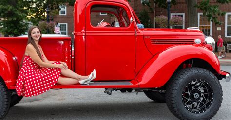 Woman In Polka Dot Dress Sitting On Red Vintage Pick Up Truck · Free
