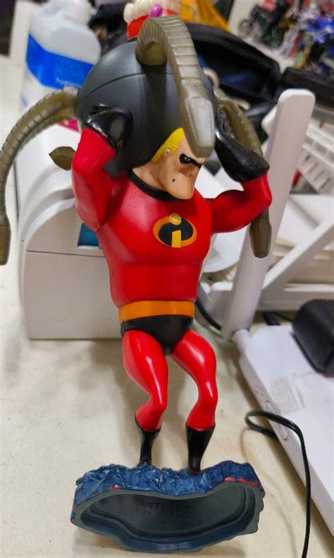 Disney The Incredibles Mr Incredible Holds Spinning Robot Spider Disney