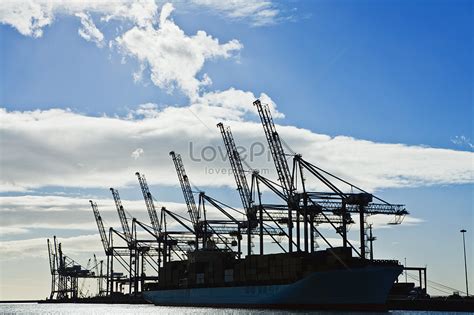 푸른 하늘 아래 크레인 실루엣 사진 무료 다운로드 Lovepik