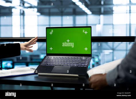 Teamworking Technicians In Data Center Use Mockup Notebook Observing Analytics Reviewing