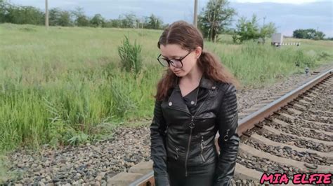 Beautiful Schoolgirl In A Leather Jacket And Glasses Walks On Flightscover