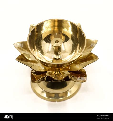 An Antique Oil Wick Lamp In Lotus Flower Shape Made Of Golden Brass