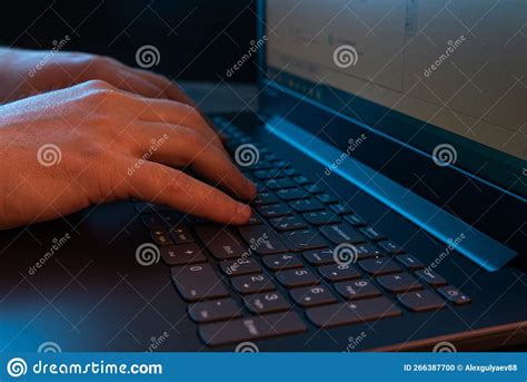 Hands Of A Man Typing On A Laptop Keyboard A Man Working On A Laptop