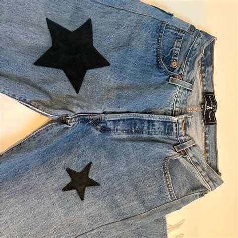 Levis Jeans Levis Light Blue High Rise Jeans With Black Stars
