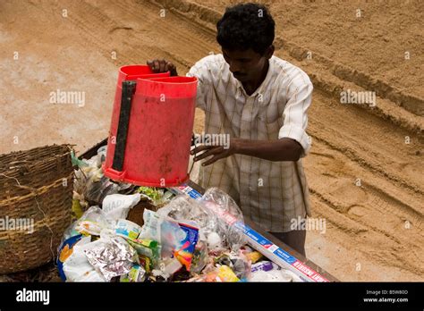 Garbageman Collecting Garbage From Houses In Chennai Tamil Nadu India