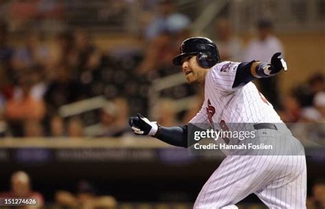 Ryan Doumit Of The Minnesota Twins Runs The Bases During The Game
