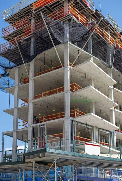 Premium Photo Construction Of A Monolithic Reinforced Concrete Building In Progress
