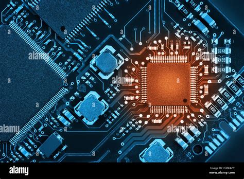 processor on a printed circuit board abstract technological background tinted in two colors