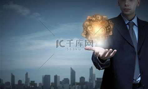 商人手持人脑的特写集思广益机制高清摄影大图 千库网