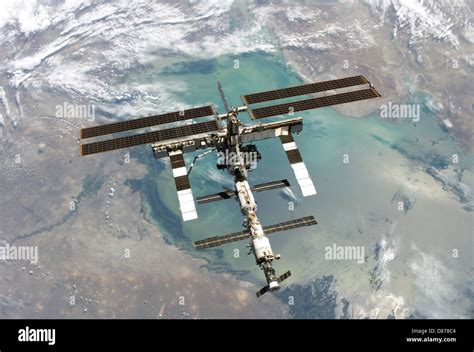 The International Space Station Iss Shown In This Image From August 2005 Serves As A
