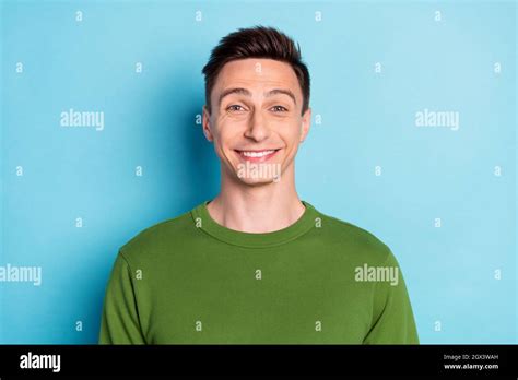 Photo Of Cheerful Positive Handsome Man Toothy Beaming Smile Wear Green