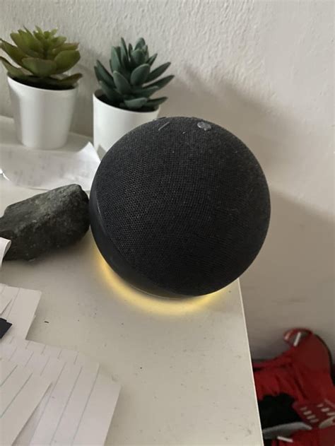 my alexa echo dot turns yellow sometimes even though i didn t call it