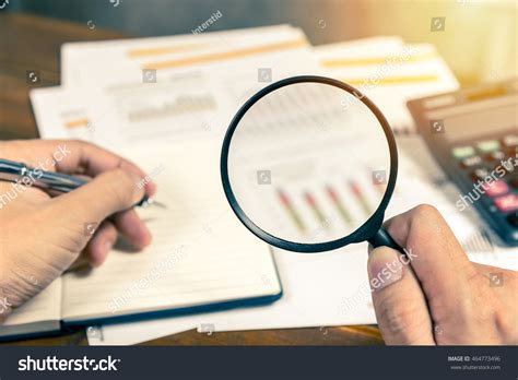 Man Hand Holding Magnifying Glass Analyzing Stock Photo Shutterstock