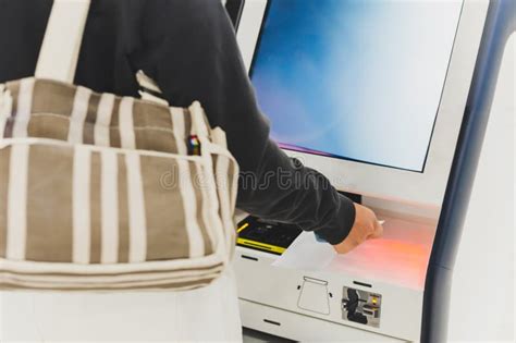 Woman Passenger Doing Self Check In Scanning Boarding Pass At Airport Stock Photo Image Of