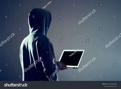Male Hacker Writing Code On Laptop Stock Photo Shutterstock