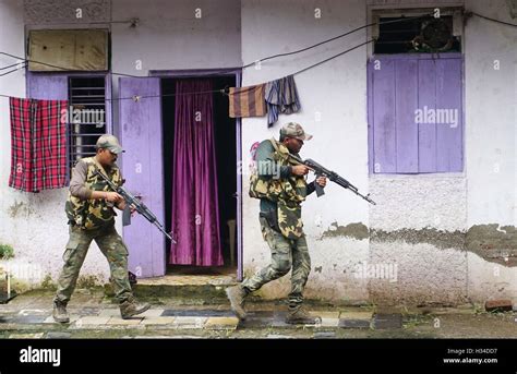 Force One Commandos Conduct A Search And Combing Operation In A Slum Area Of Uran About 47 Km