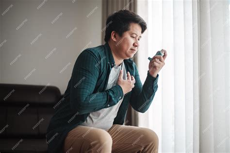 Premium Photo Panoramic Shot Of Asthmatic Man Using Inhaler With Spacer Fat Man Using Asthma