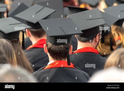 Yong Babe Wearing Graduation Caps At A Graduation Ceremony Stock Photo Alamy