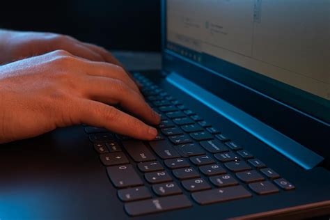 Premium Photo Hands Of A Man Typing On A Laptop Keyboard A Man Working On A Laptop Selective Focus