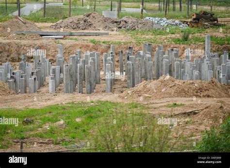 Reinforced Concrete Piles Driven Into Pit At Construction Site Driving