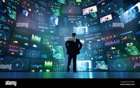 Businessman Analyzing Real Time Financial And Technological Data On Immersive Screen Wall Stock