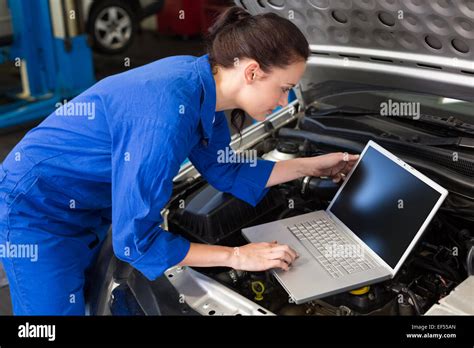 Mechanic Using Laptop On Car Stock Photo Alamy