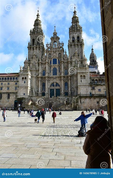 Cathedral With Pilgrims Taking Pictures At Final Stage Of Camino De