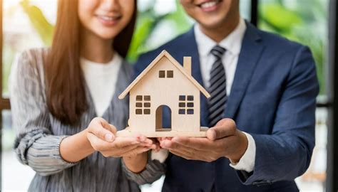 Premium Photo Married Couples Hands Holding Wooden House Symbolizing