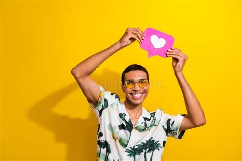Photo Of Cheerful Cool Guy Dressed Stylish Clothes Arms Above Head