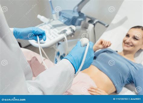 Gynecologist Attempting Ultrasonic Examination Of Patient Stock Image Image Of Office