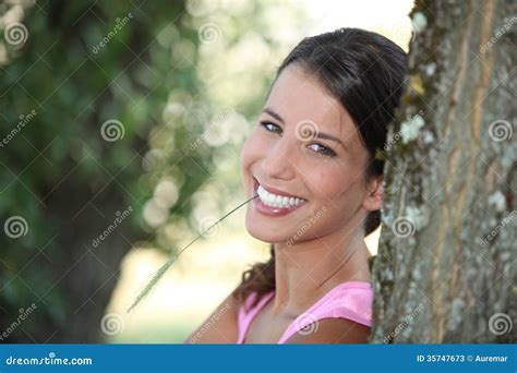 Woman Leaning On A Tree Stock Image Image Of Female