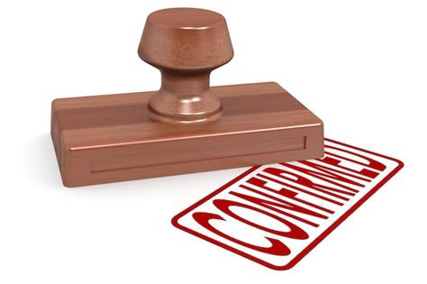 Premium Photo Wooden Stamp Confirmed With Red Text