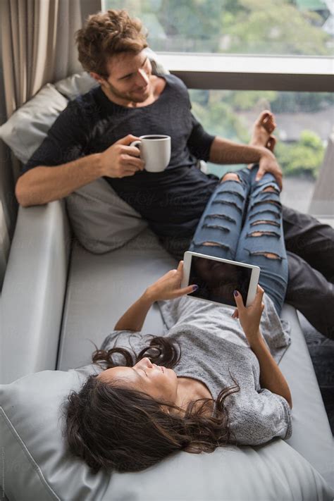 Lazy Morning Affectionate Couple Relaxing Together Del Colaborador De Stocksy Jovo