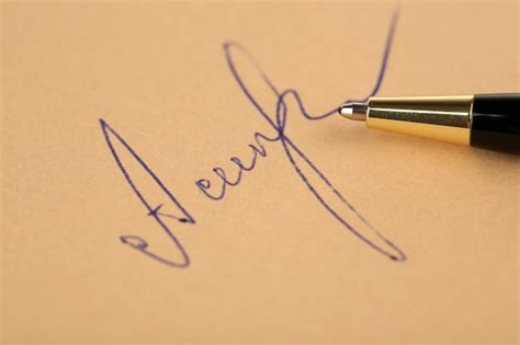 Premium Photo Pen And Signature On Paper Background