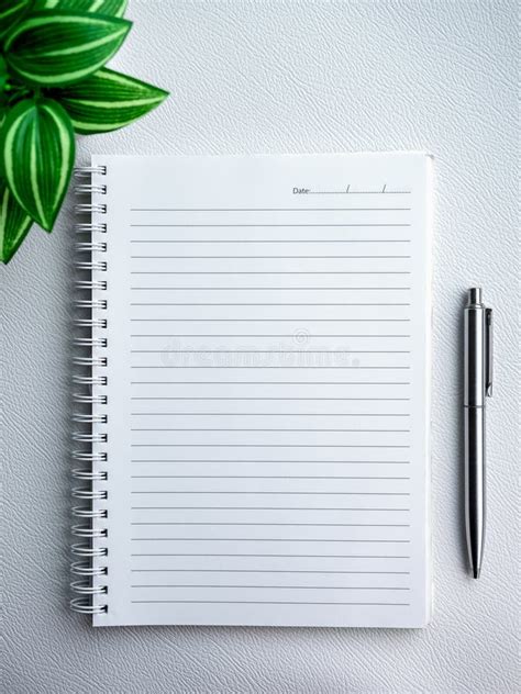 Template White Paper Sheet With Line And Date For Note On Vertical Spiral Notepad Near A Silver