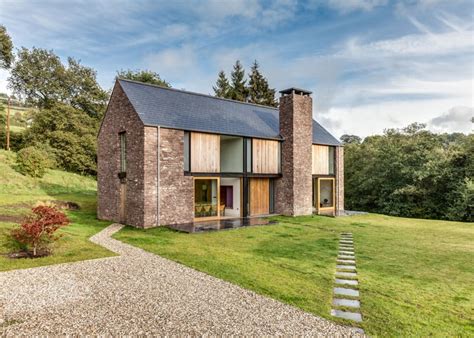 Sandstone Clad House In Wales Resembles Local Barns