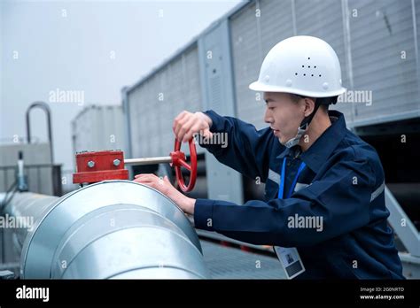 Technical Personnel In The Factory Inspection Pipeline Switch Stock