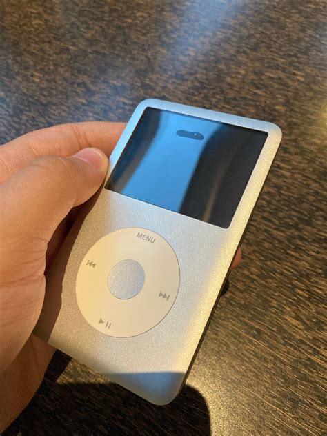 Found An Old Ipod In A Closet Wondering What The Black Spot On The Screen Is Thinking Its The