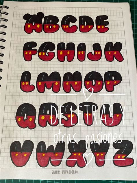 The Letters And Numbers Are Drawn On Top Of A Sheet Of Paper With