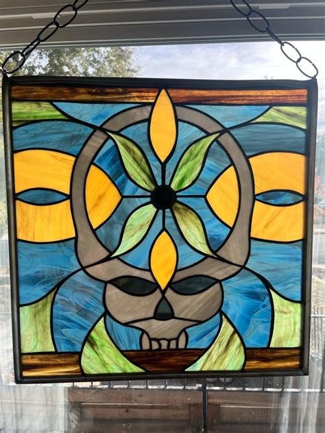 Help me find the artist of these beautiful stealie stained glass pieces ...