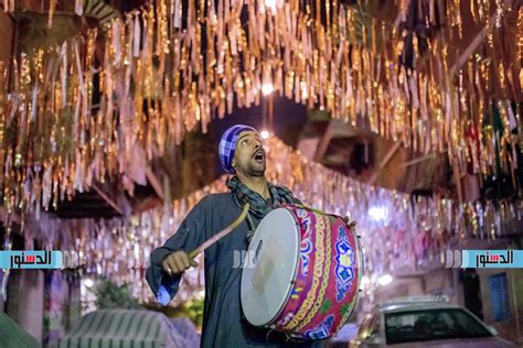 المسحراتى فى إحدى المناطق الشعبية