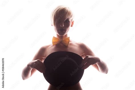 Sexy Sensual Gorgeous Woman Covering Her Breasts With A Hat On White