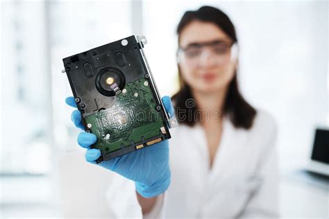 Repaired And Ready For Use A Young Woman Repairing Computer Hardware In A Laboratory Stock