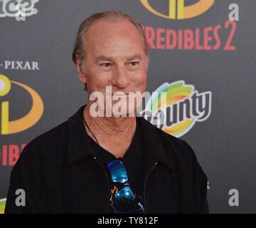 Incredibles 2 Bob Parr Voice Craig T Nelson Holding Jack Jack