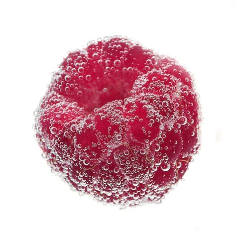 Premium Photo Raspberry In A Water On White Background