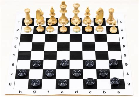 premium photo chess and checkers pieces in starting positions